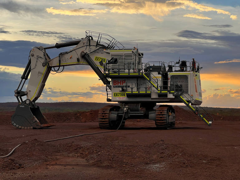 Electric excavator operating on BHP mine site - Fleet EV News
